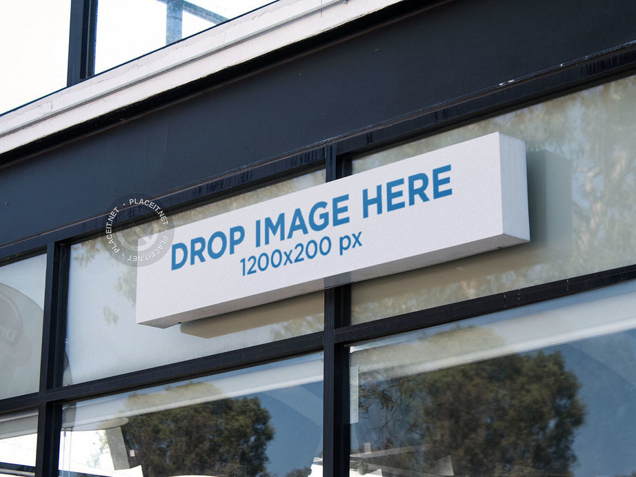 Placeit - Long Horizontal Sign Mockup Outside a Front Window of a Store