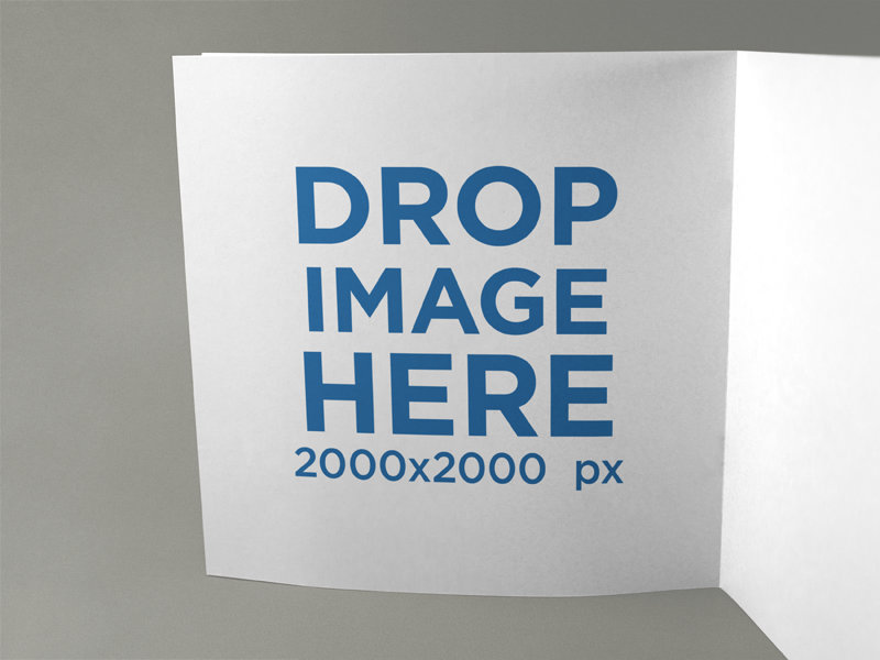 Placeit - Open Square Booklet Template Standing on a Solid Surface