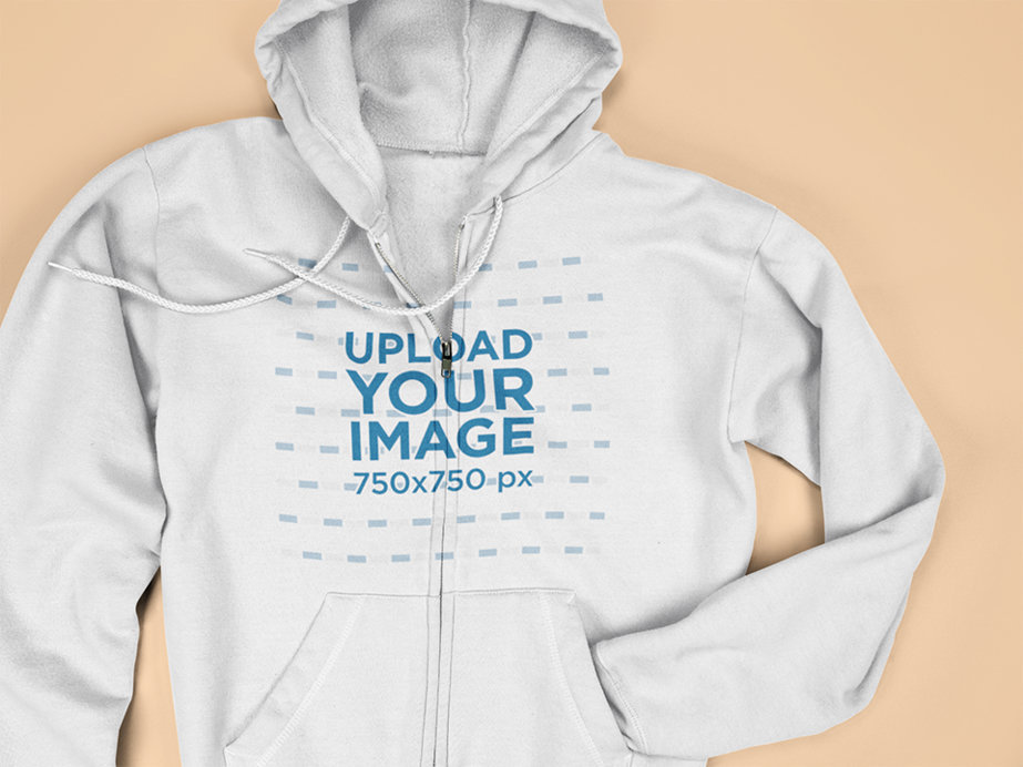 Placeit - Mockup of a Full Zip Hoodie Hiding a Sleeve Lying on a Flat ...