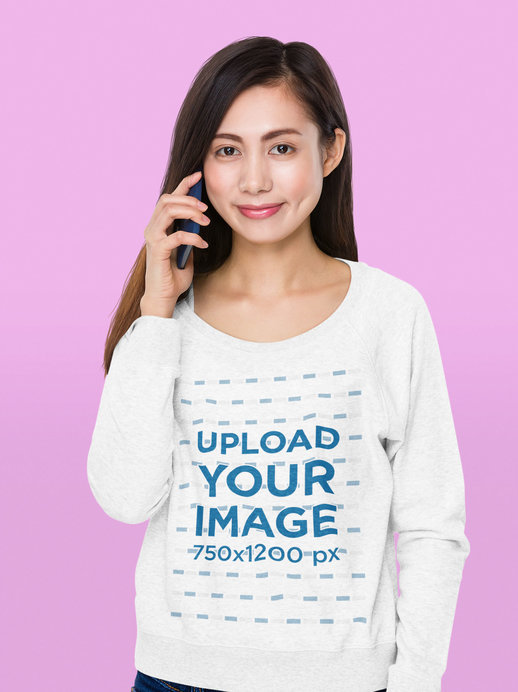 Placeit - Sweatshirt Mockup of a Woman Talking on the Phone at a Studio