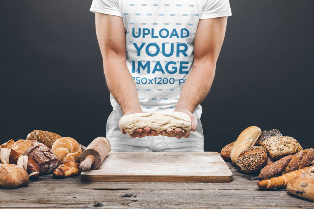 Placeit - T-Shirt Mockup Featuring a Baker Making Bread Dough