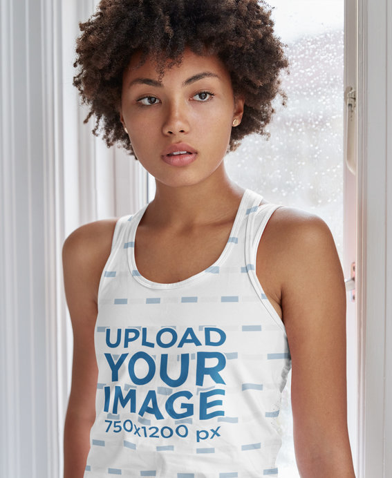 Placeit - Mockup of a Serious Curly-Haired Wearing a Sublimated Tank Top