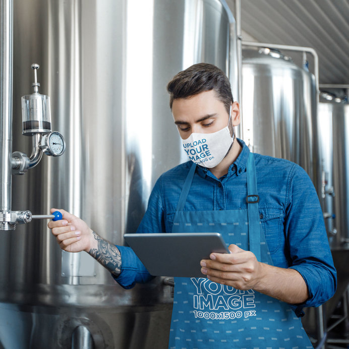 Placeit - Apron and Face Mask Mockup Featuring a Man at Work