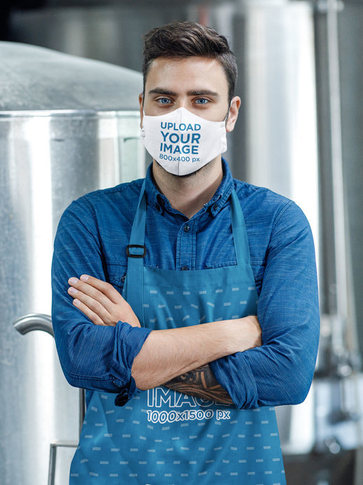 Placeit - Apron and Face Mask Mockup of a Man Posing With His Arms Crossed