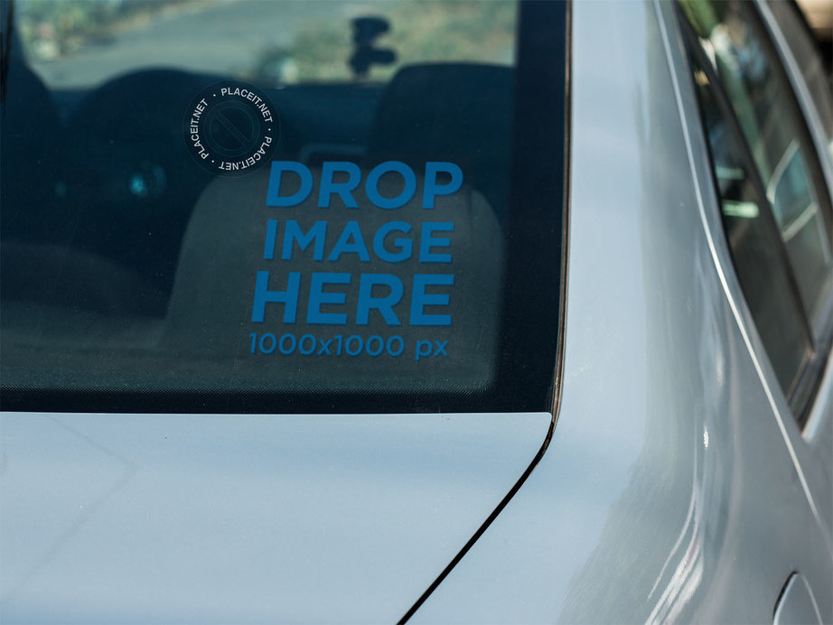 Placeit - Small Square Decal Mockup on the Back Window of a Car