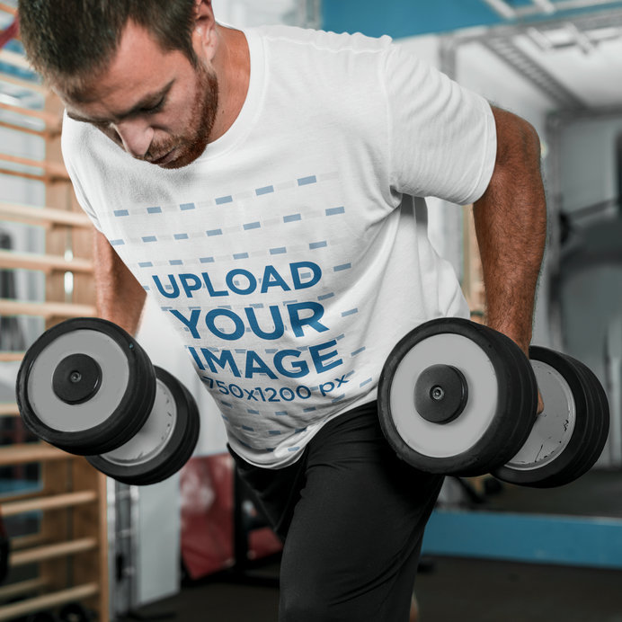 Placeit - T-Shirt Mockup of a Bearded Man Doing a Strength Workout